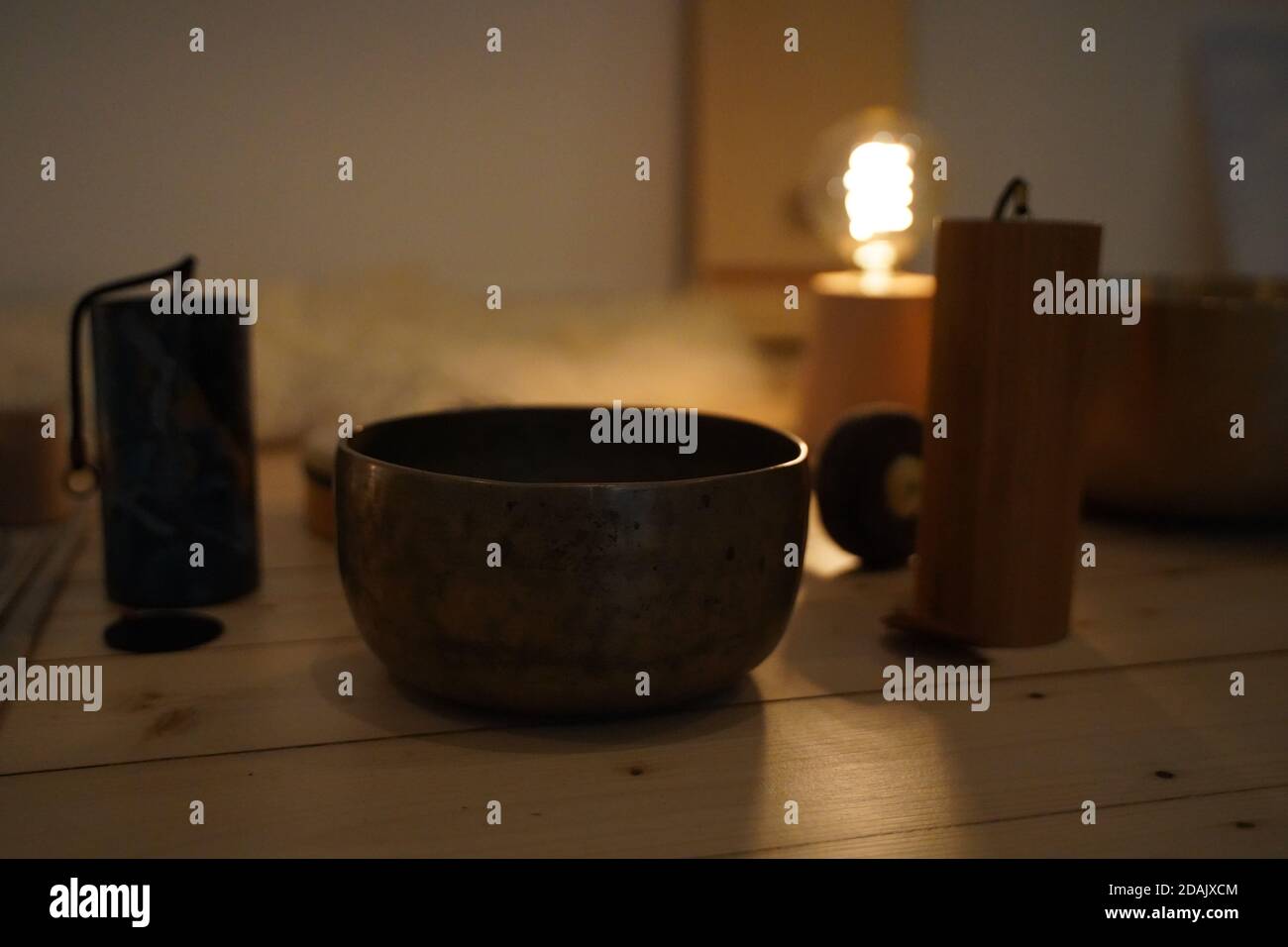 Sound healing set up with a buddha deity and lots of sound instruments ...