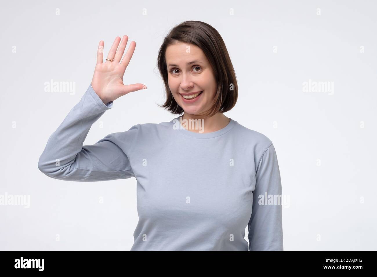 Hello hand gesture hi-res stock photography and images - Alamy