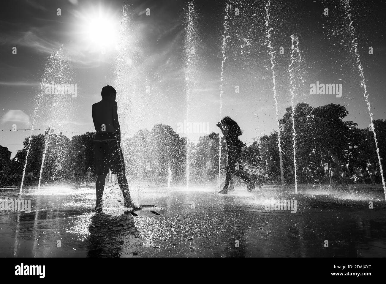 UZHGOROD, UKRAINE - May 28, 2017: Happy children playing in a water ...