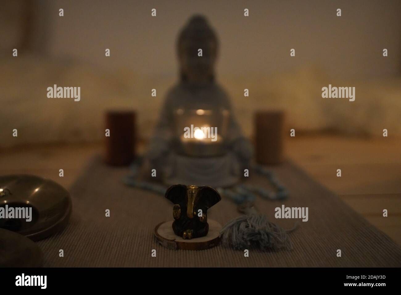 Sound healing set up with a buddha deity and lots of sound instruments ...