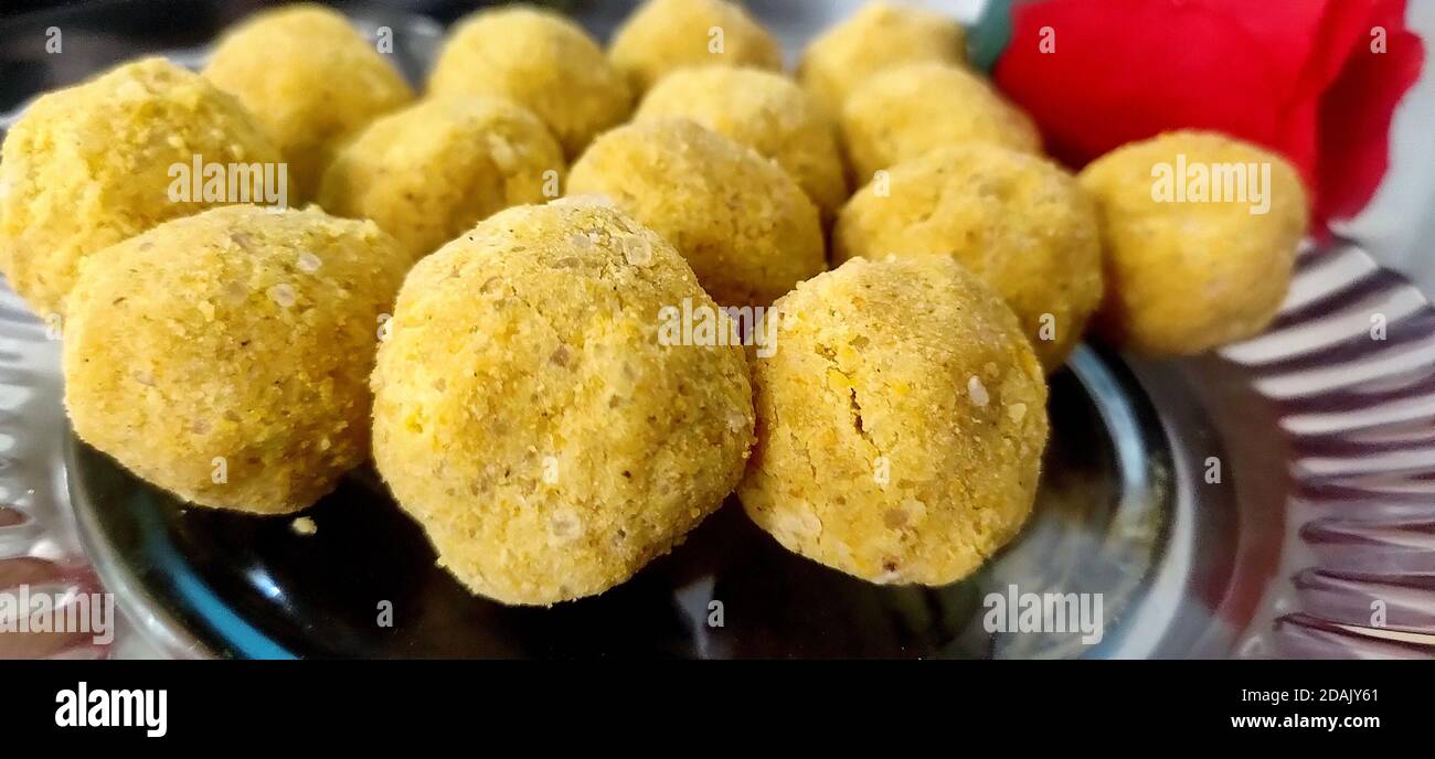 A mouth watering sweet - Besan laddoo made by roasted gram flour, ghee ...