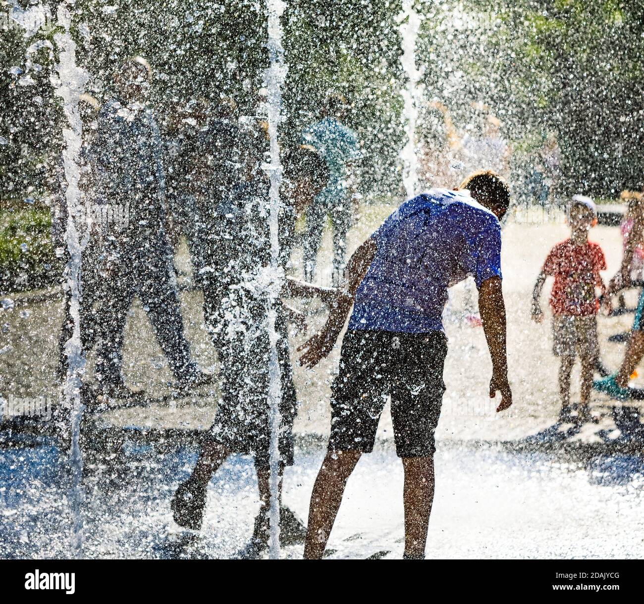 UZHGOROD, UKRAINE - May 28, 2017: Happy children playing in a water ...