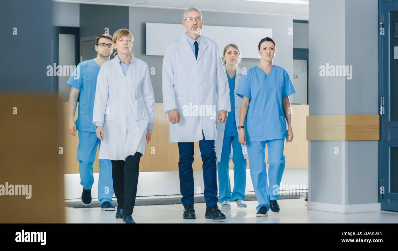 Group of female nurses walking hi-res stock photography and images - Alamy