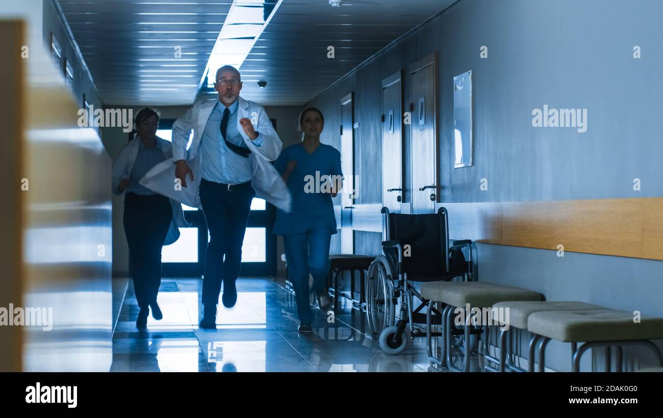 Emergency in the Hospital, Doctors and Nurses Running through the ...