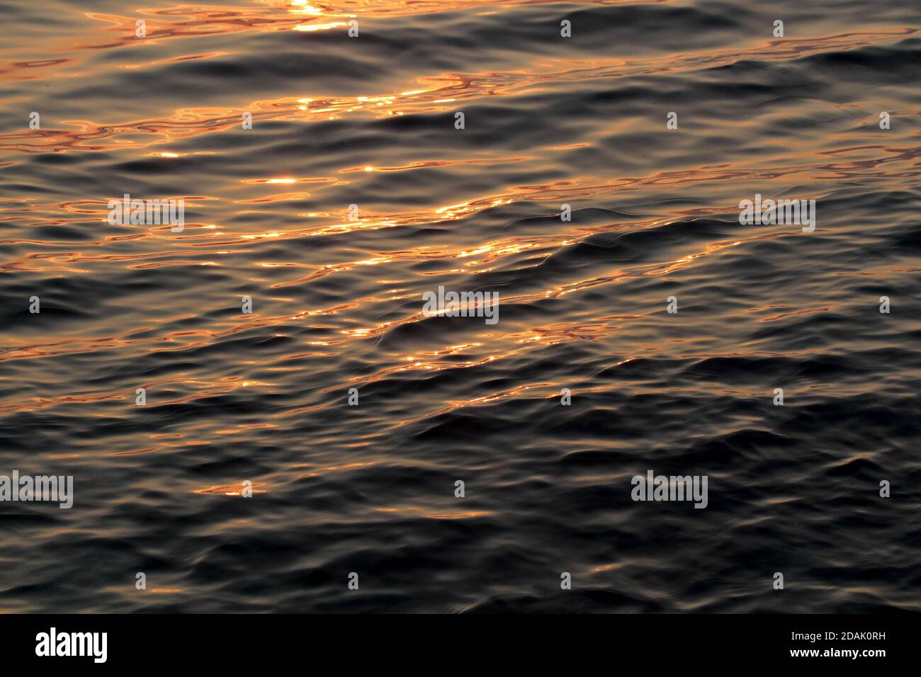 Evening sunlight on sea, very calming Stock Photo - Alamy
