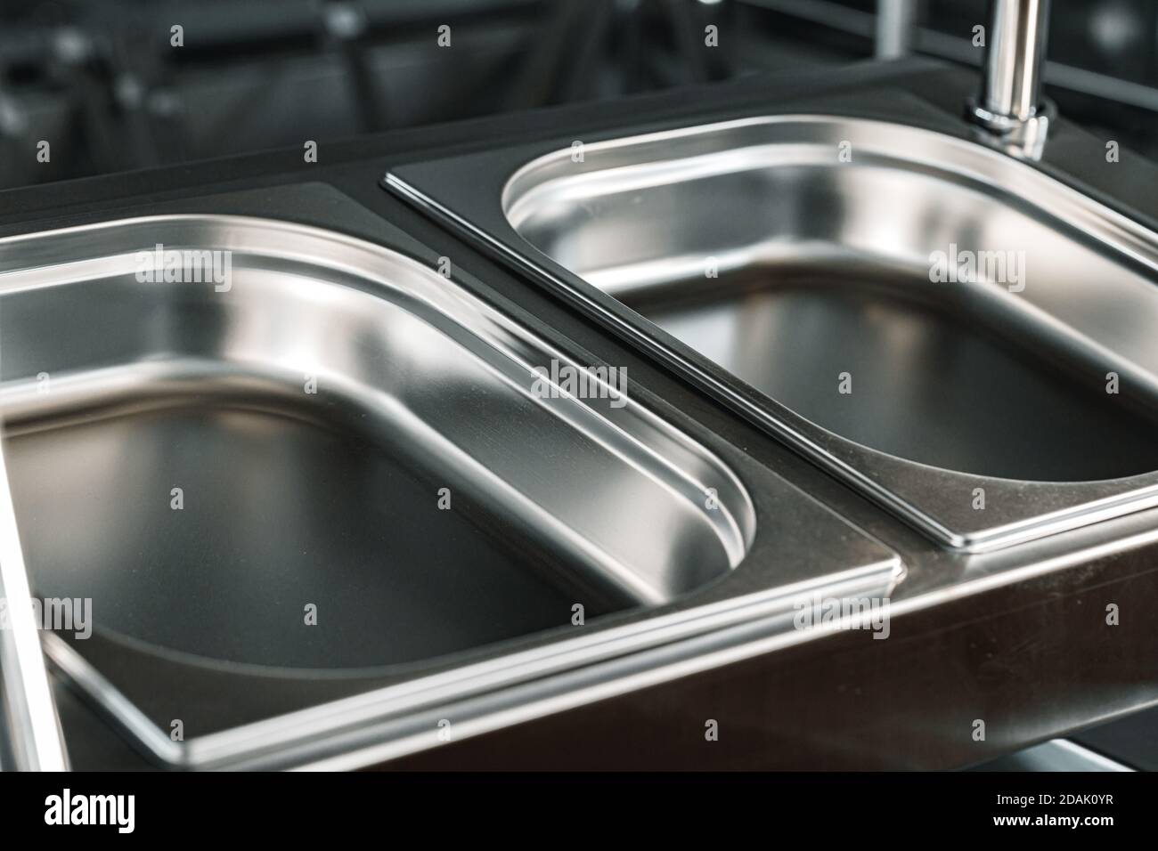Industrial kitchen metal trays for buffet catering Stock Photo - Alamy