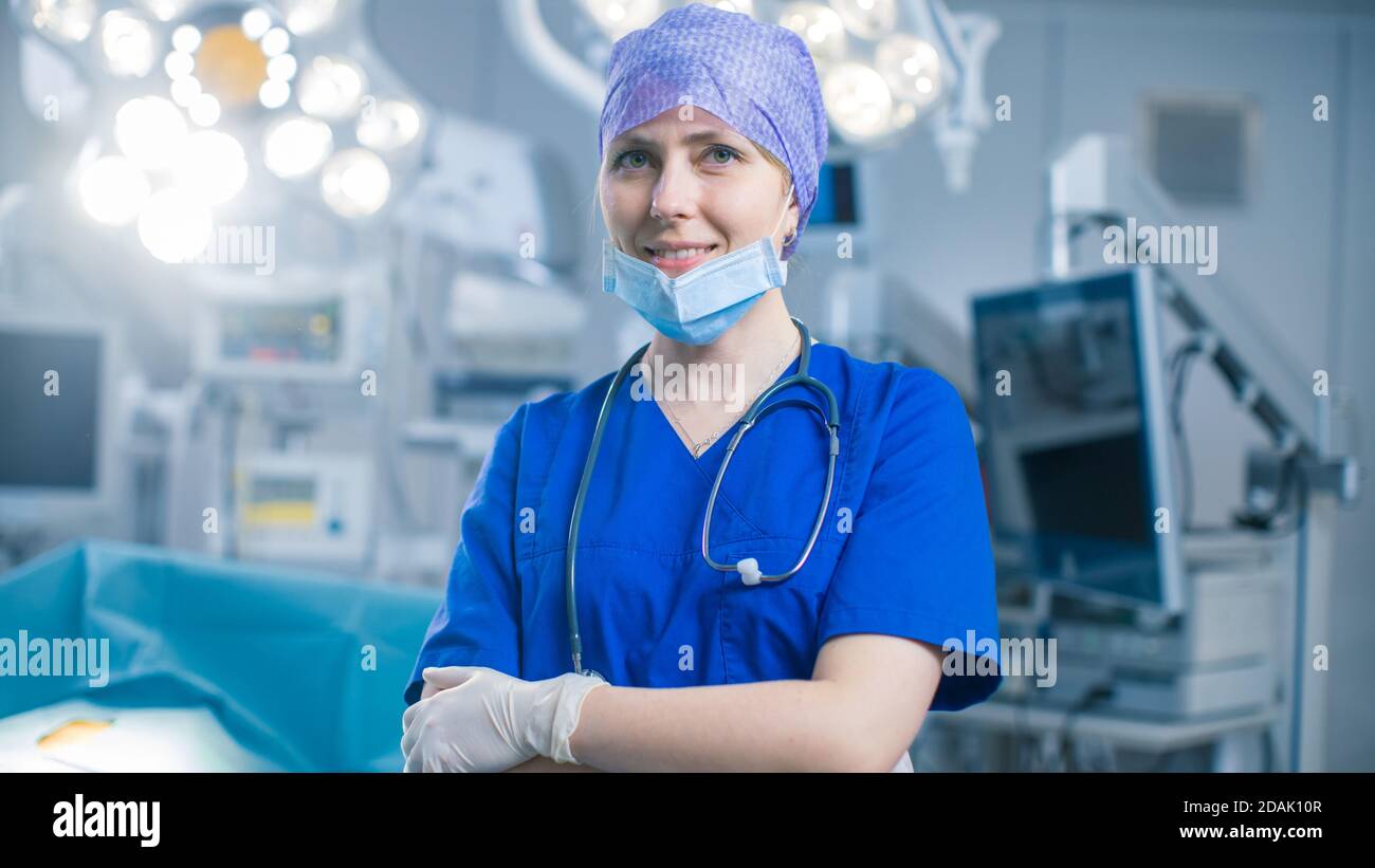 Portrait of the Professional Nurse Medical Assistant Taking off ...