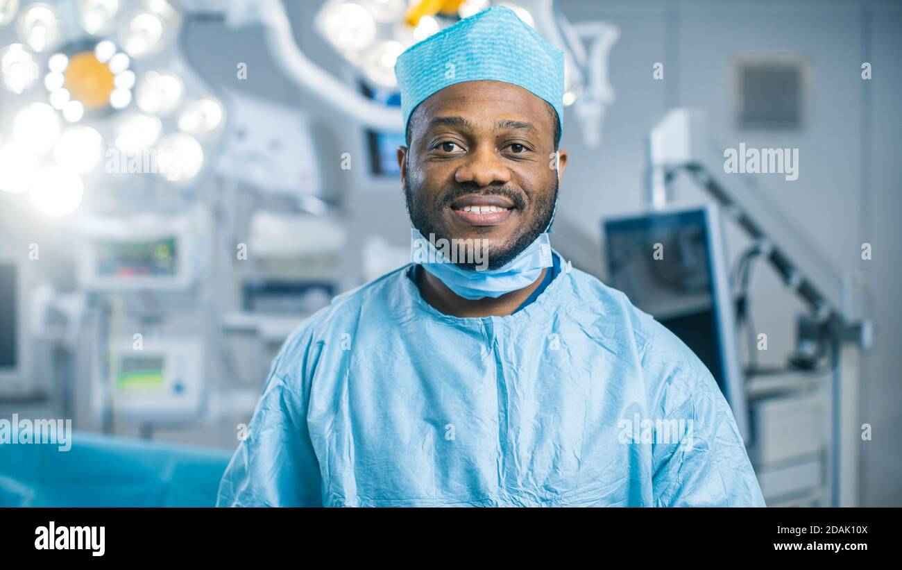 Portrait of the Professional Surgeon Takes off Surgical Mask after ...