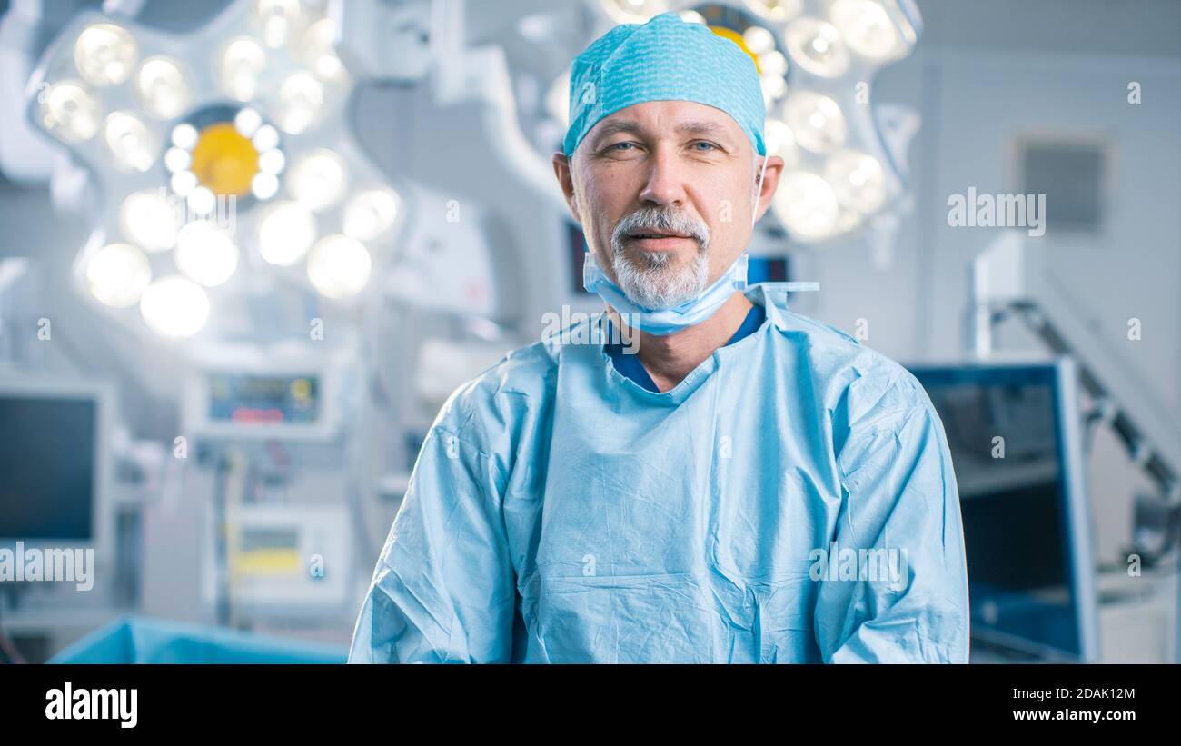 Portrait of the Professional Surgeon Looking Into Camera and Smiling ...