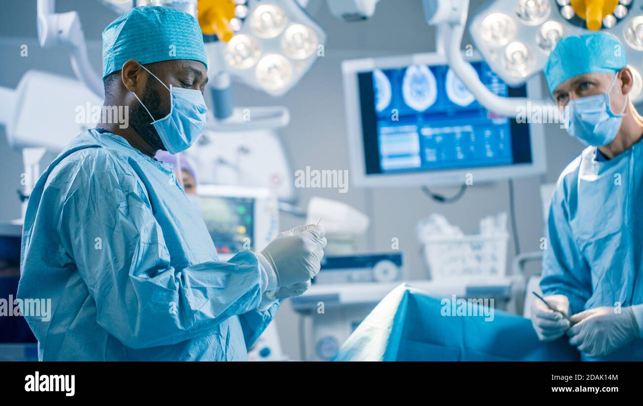 Portrait of the Black Professional Surgeon Performing Invasive Surgery ...