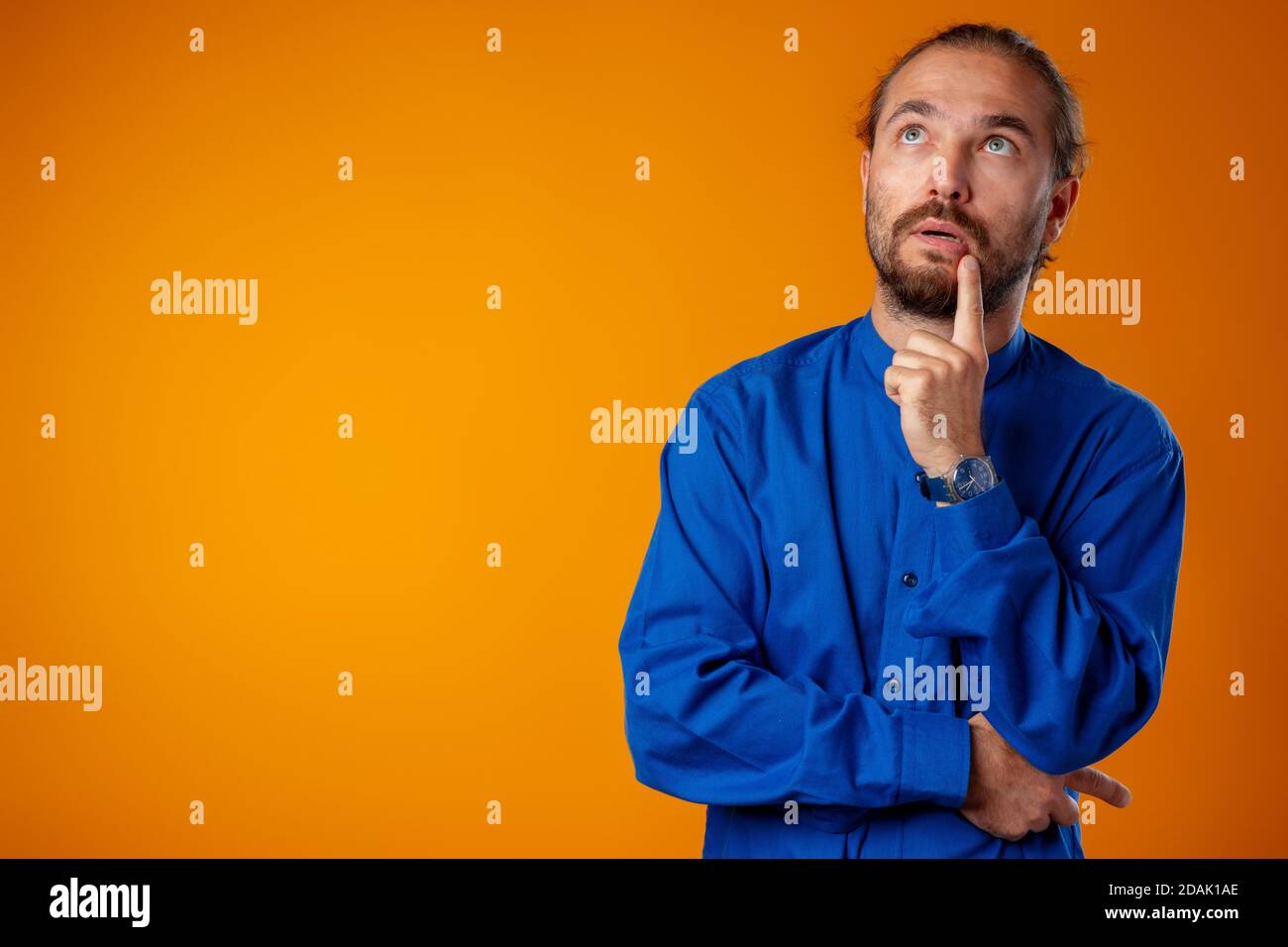 Confused bearded young man hi-res stock photography and images - Alamy