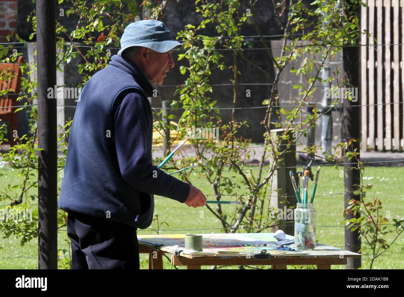 Girvan Artist James Harrigan at work in Orchard Gardens Girvan, South ...
