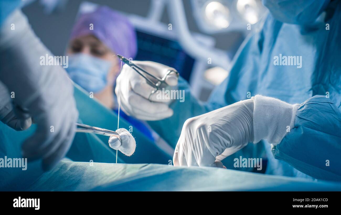 Close-up on Hands of the Professional Surgeon Suture Wound after ...