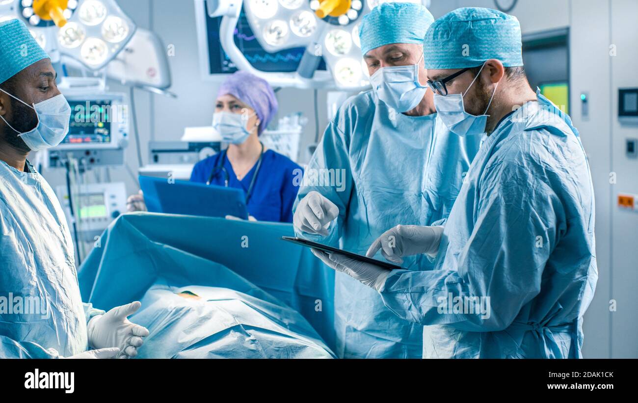 Medical team performing surgery digital hi-res stock photography and ...