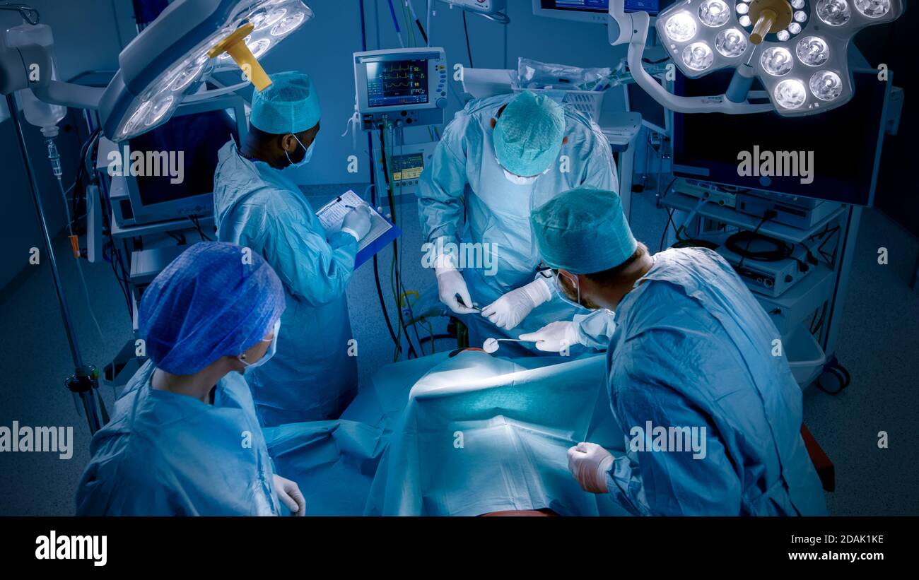 High Angle Shot of Diverse Team of Professional surgeon, Assistants and ...