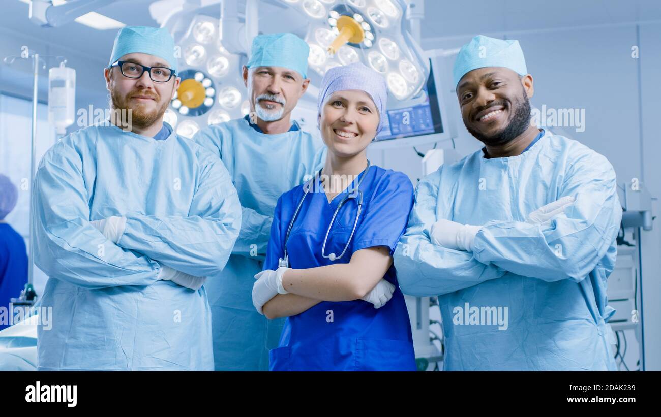 Diverse Team of Professional surgeon, Assistants and Nurses Standing ...