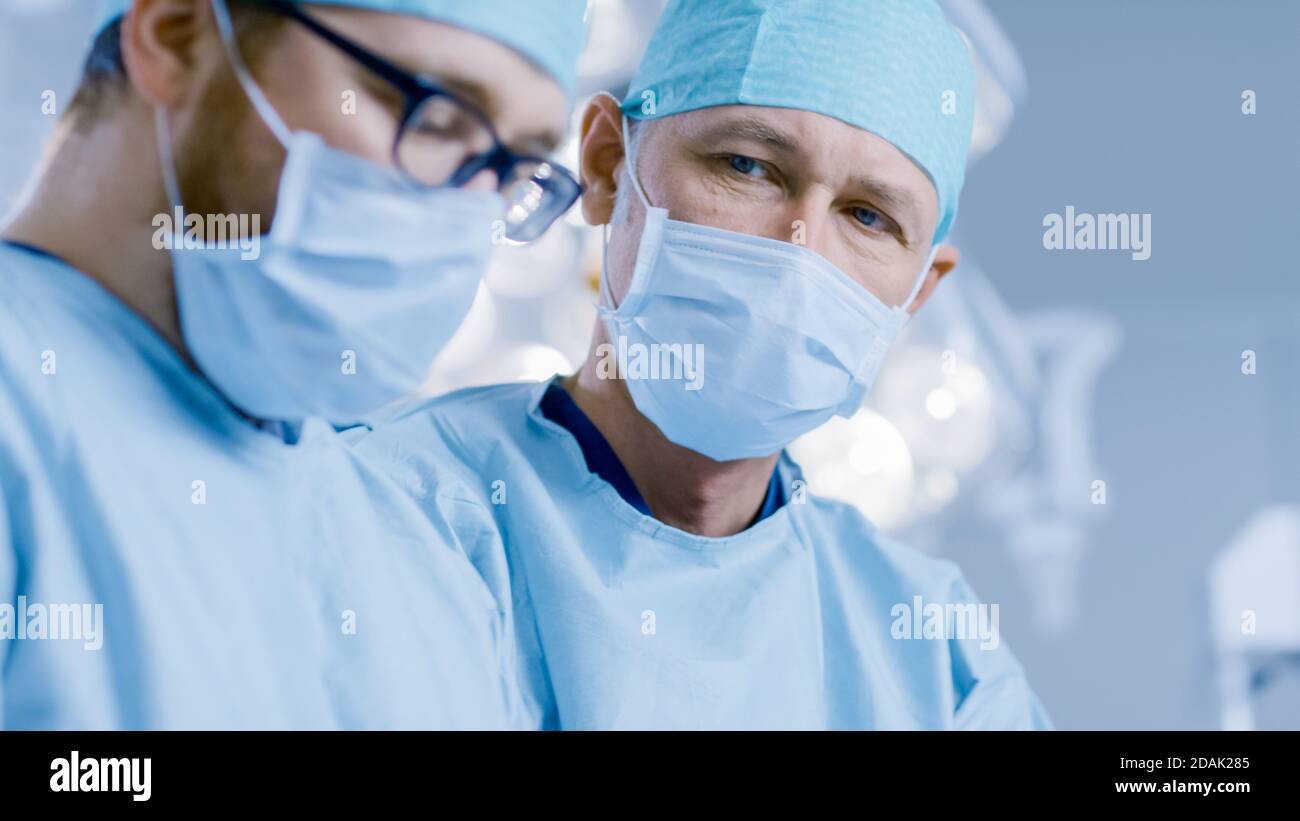 In the Operating Room Two Surgeons During the Surgery Procedure ...