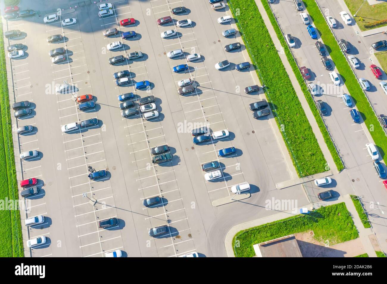 Aerial top down view of the parking lot with many cars of supermarket ...