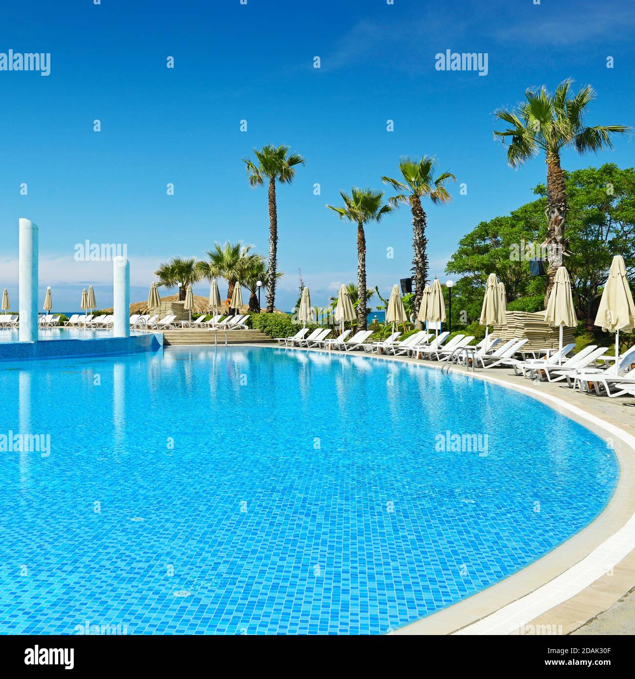 Outdoor swimming pool on the beach Stock Photo - Alamy
