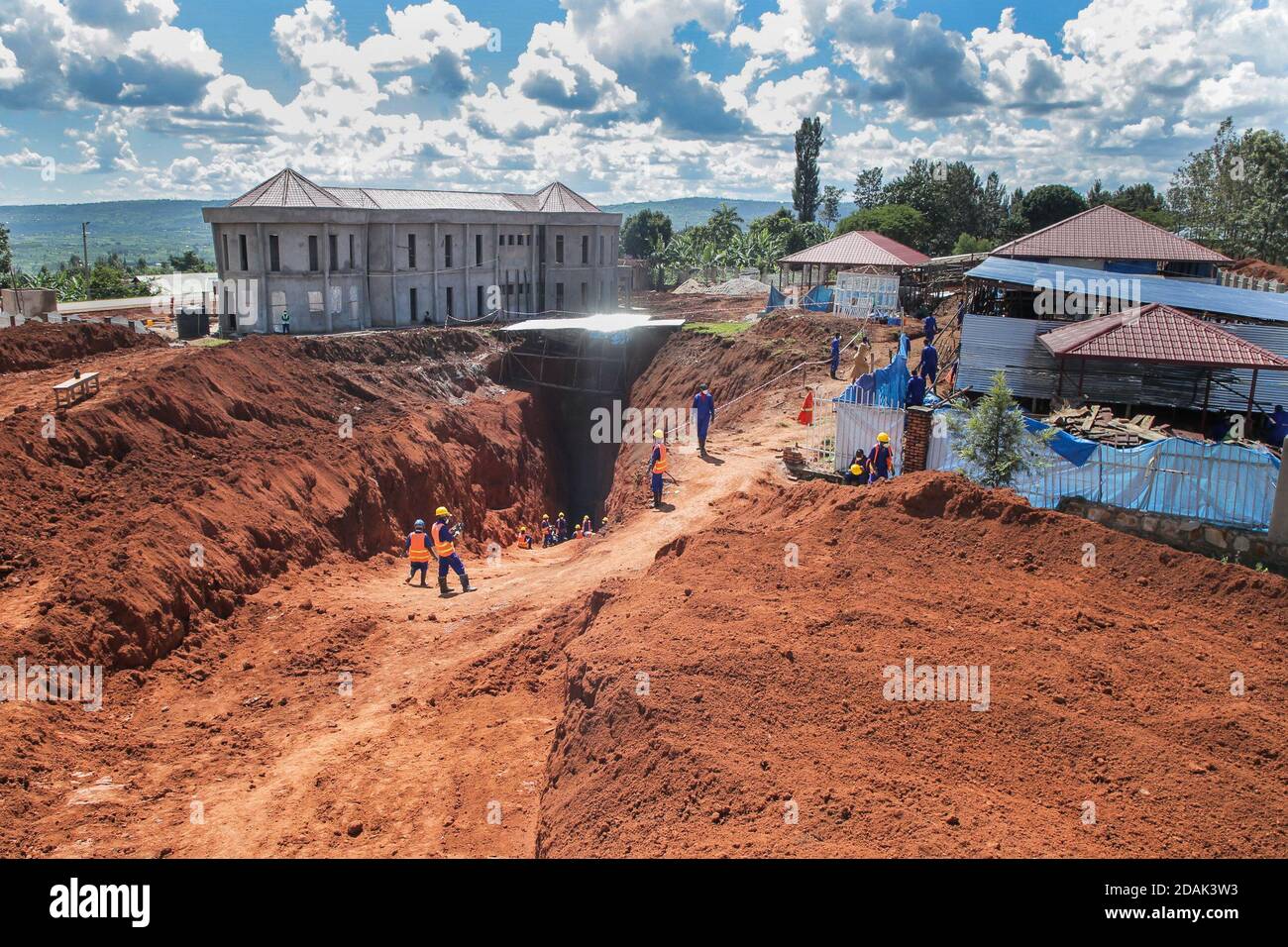 Gatsibo, Rwanda. 12th Nov, 2020. Volunteers dig out remains of victims ...