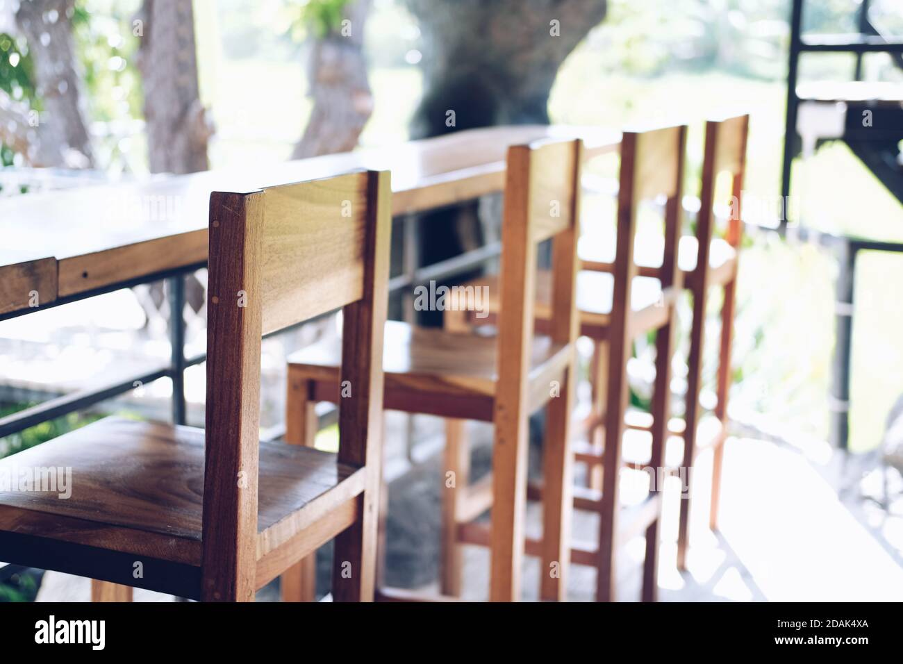 wooden chair on terrace in cafe coffee shop restaurant Stock Photo - Alamy