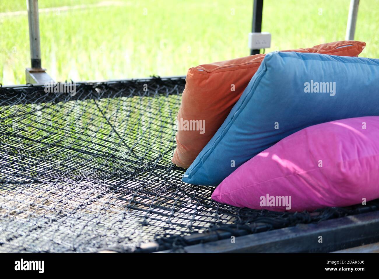 black thread rope net bed pillow for sleeping beside rice paddy field ...