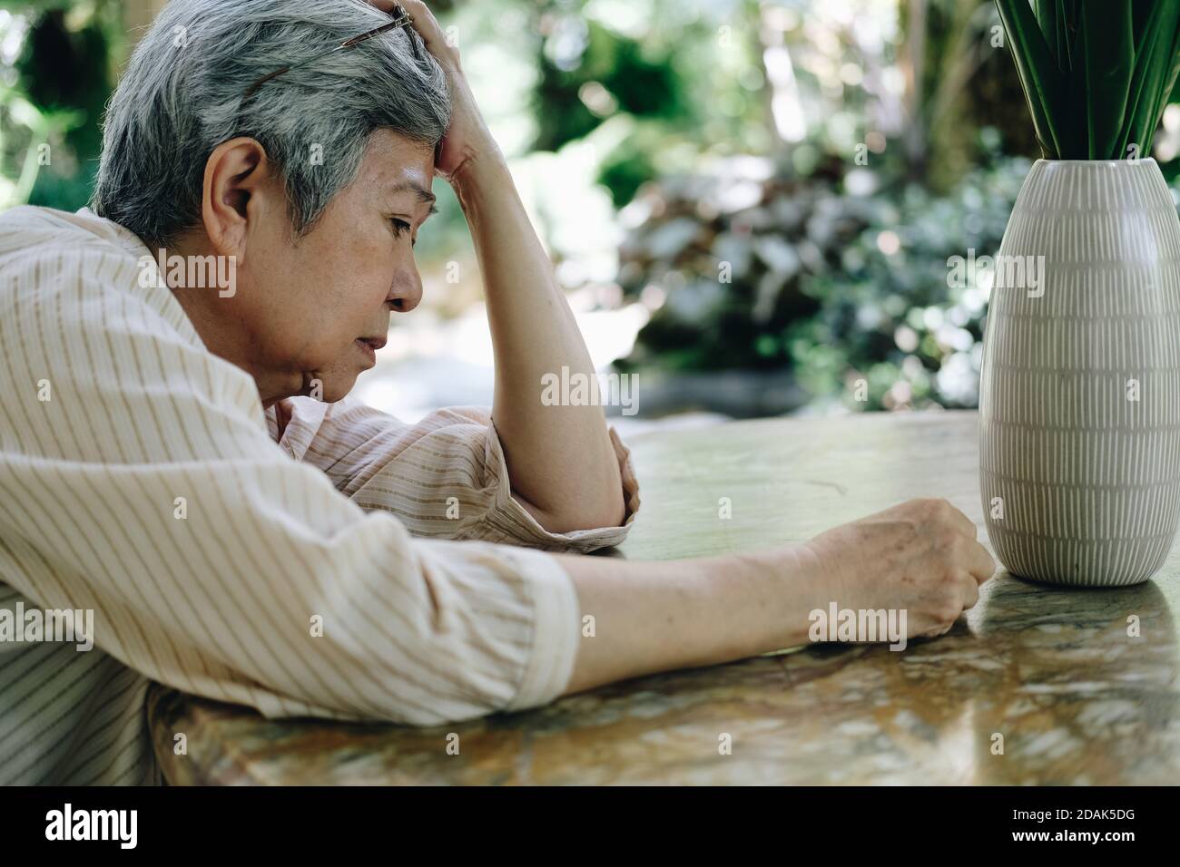 stressed depressed fatigued sad upset asian old asian elderly senior ...