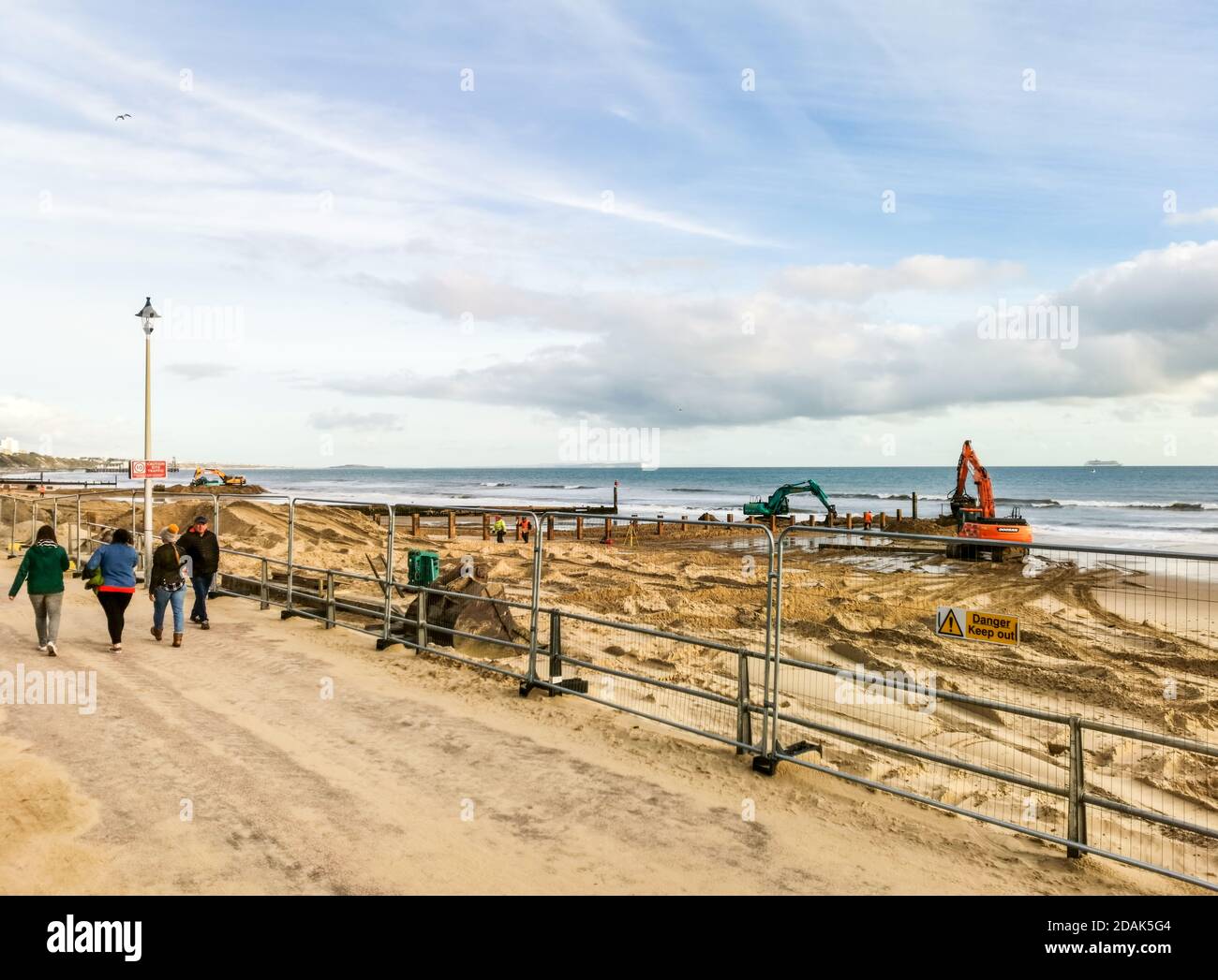 Bournemouth, UK. Friday 13 November 2020. Heavy duty diggers work at ...