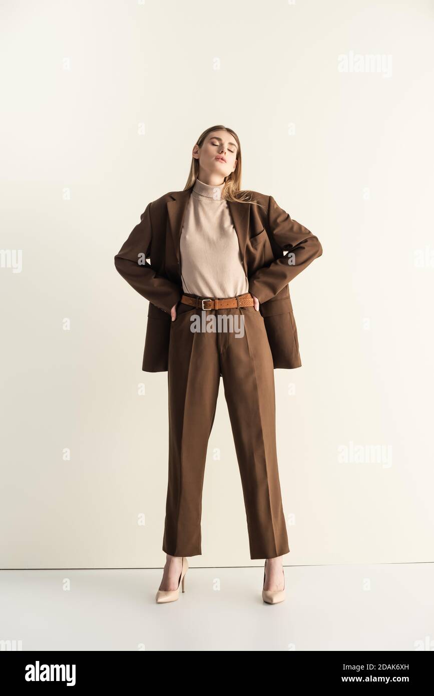 Woman hands hips suit hi-res stock photography and images - Alamy