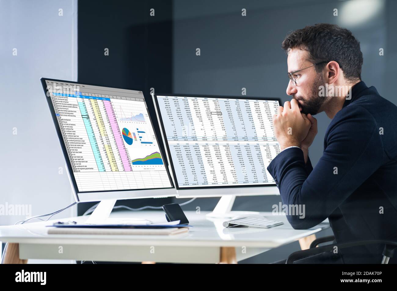 Analyst Employee Using Spreadsheet On Computer Screen Stock Photo - Alamy