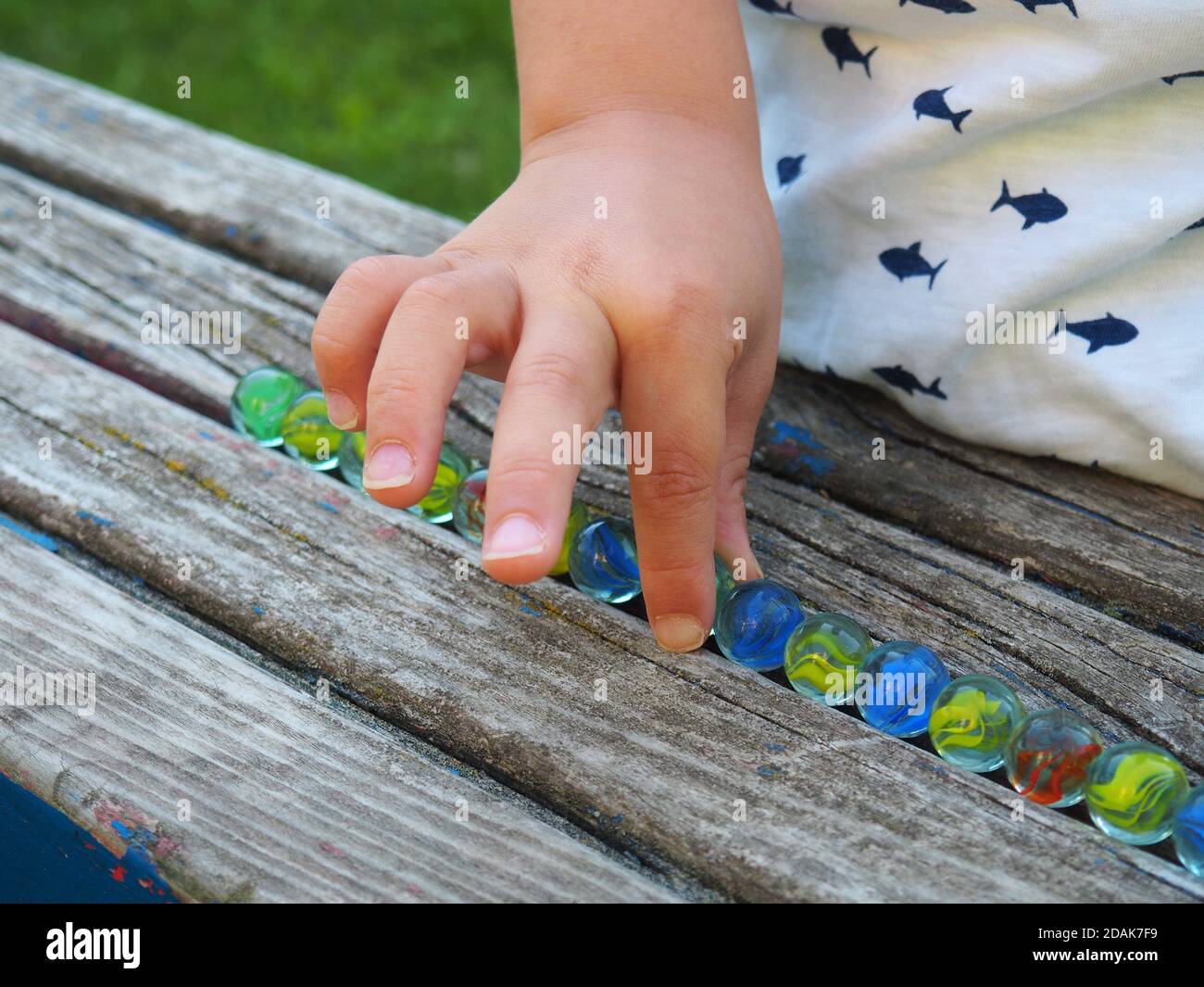 Children playing marbles game in hi-res stock photography and images ...