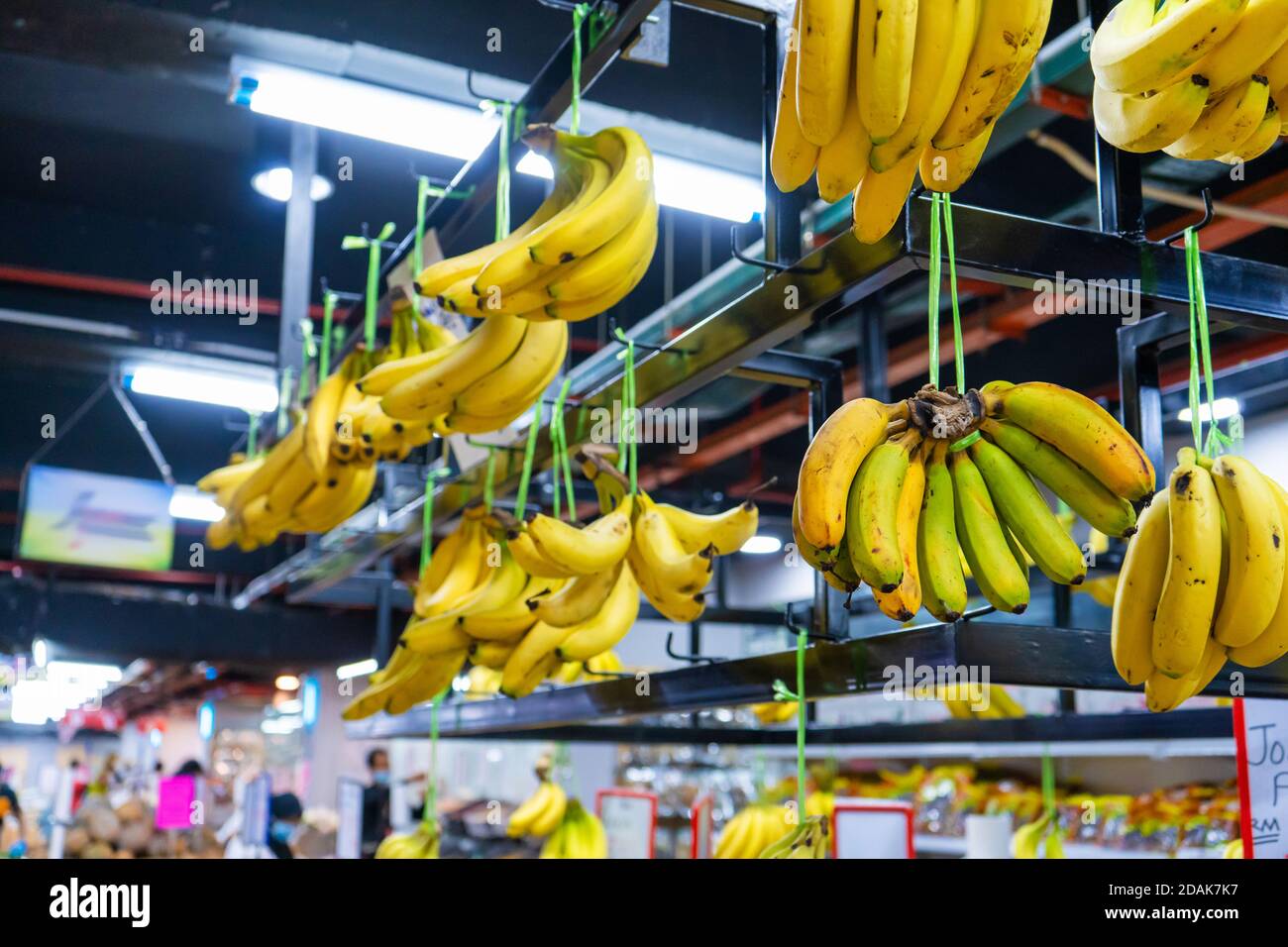 Fresh bananas in the vegetable section of the grocery store Stock Photo ...