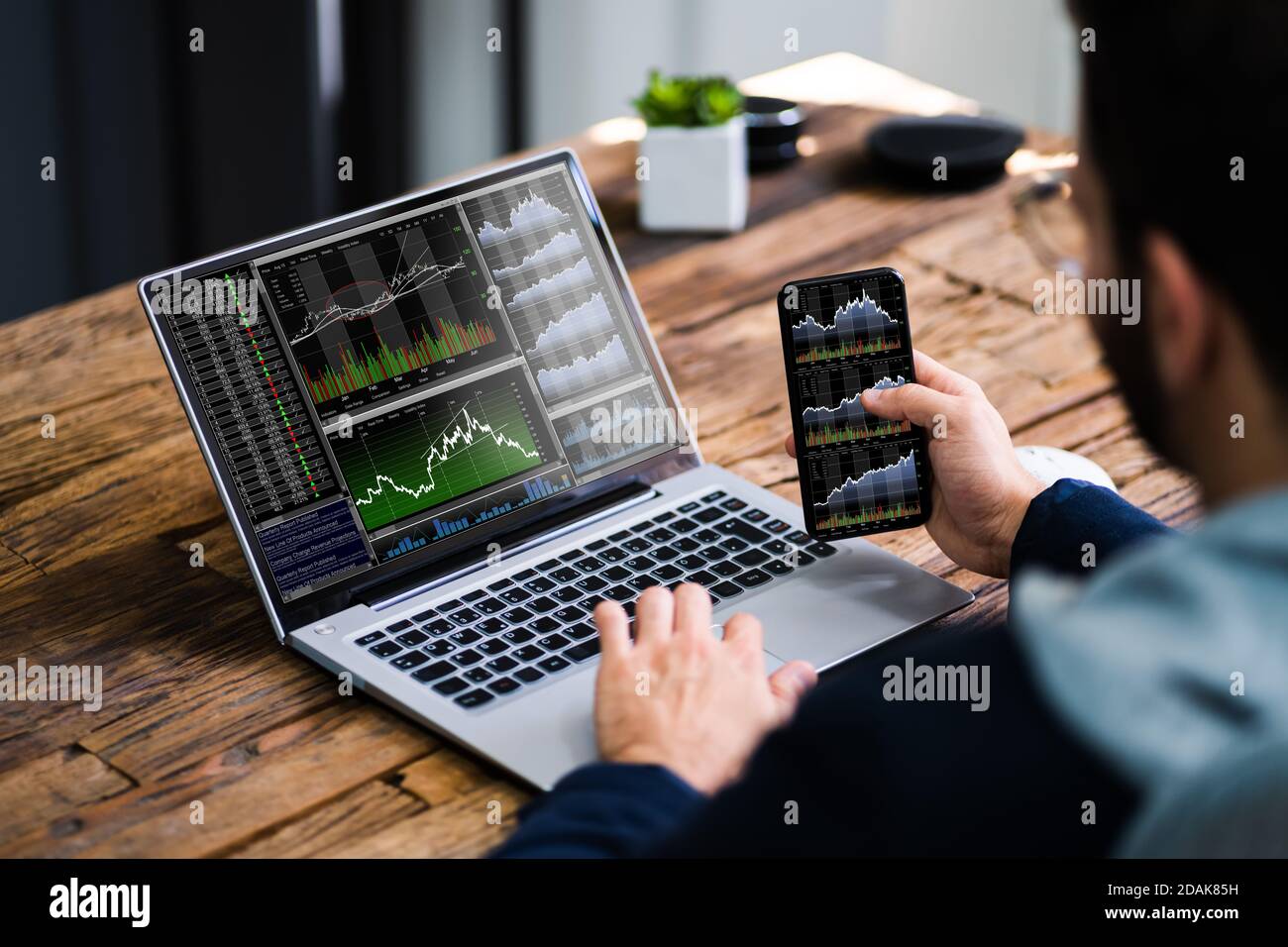 Stock Exchange Business Analyst Using Laptop Computer Stock Photo - Alamy