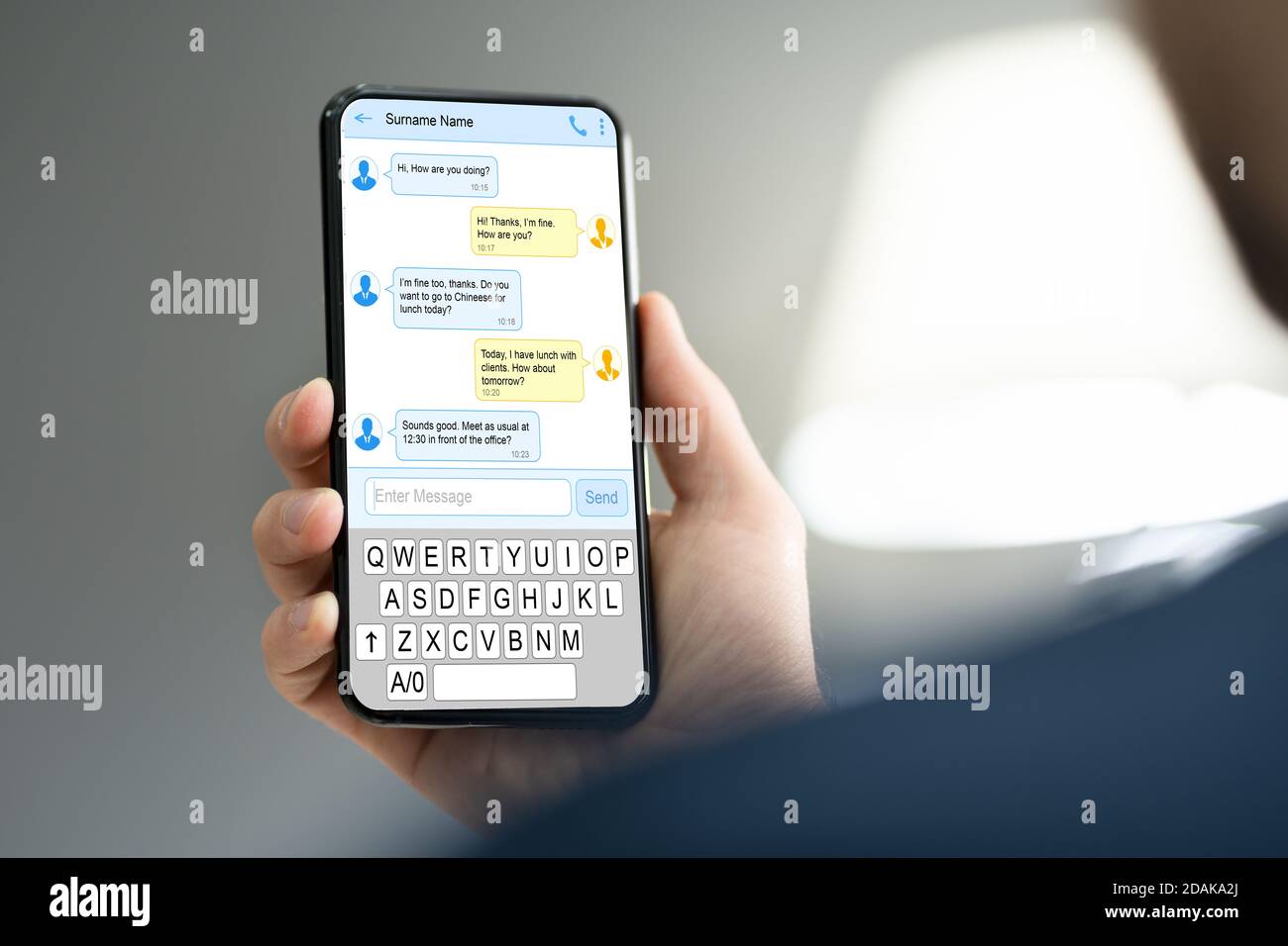 Hand Holding Cellphone Or Smartphone Texting And Reading Text Stock ...