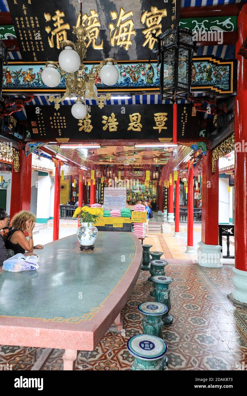 A table and seats inside the Chinese Assembly Hall, Hoi An, Vietnam ...