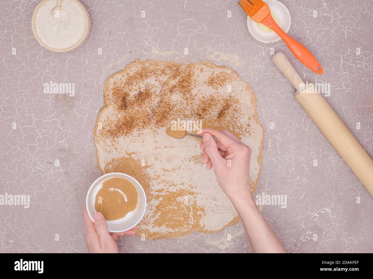 A step-by-step recipe for sweet cinnamon rolls. Step 4- sprinkle the ...