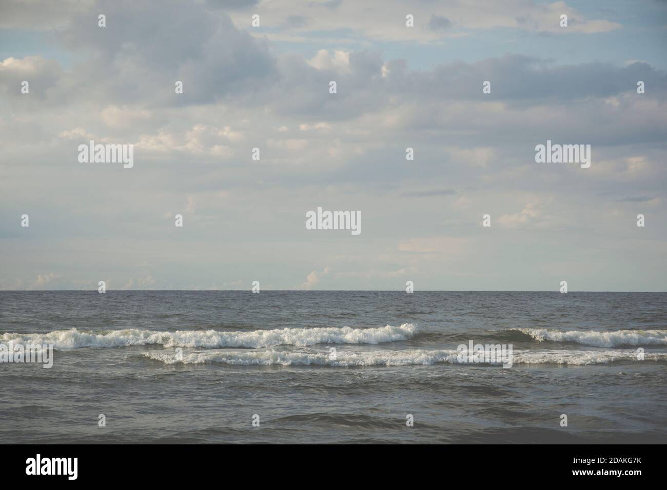 nostalgy landscape with a coastline and sea with waves Stock Photo - Alamy