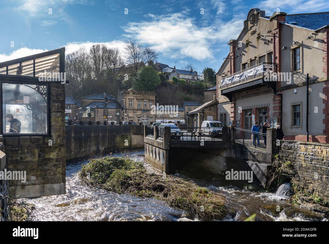 Strongly back lit image of The River Holme at Holmfirth showing the ...