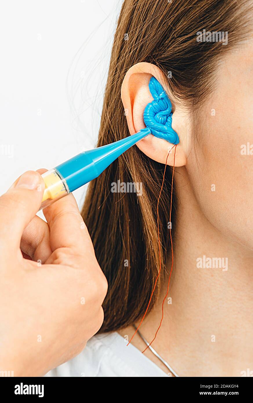 Process of making earplugs from an impression of an individual human ...