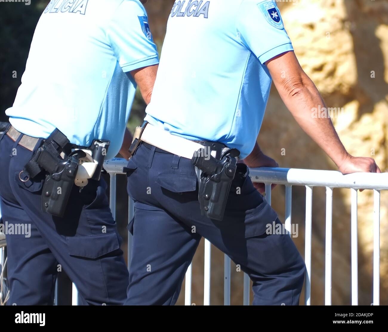 Two portuguese police officers, policemen protecting th law Stock Photo ...