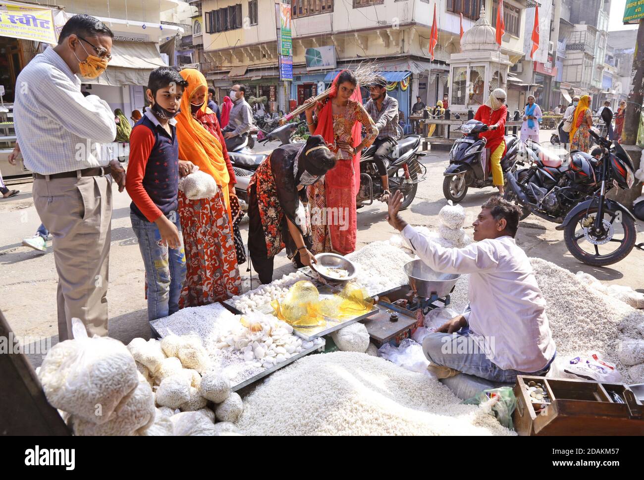 Beawar, Rajasthan, India, Nov. 13, 2020: Rajasthani people buys sweets ...