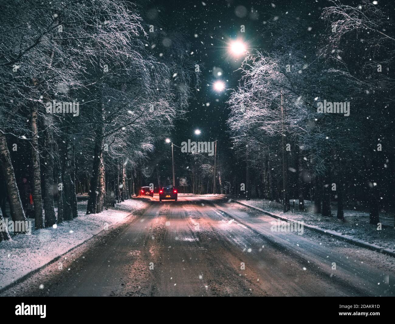 Car evening snow country road hi-res stock photography and images - Alamy