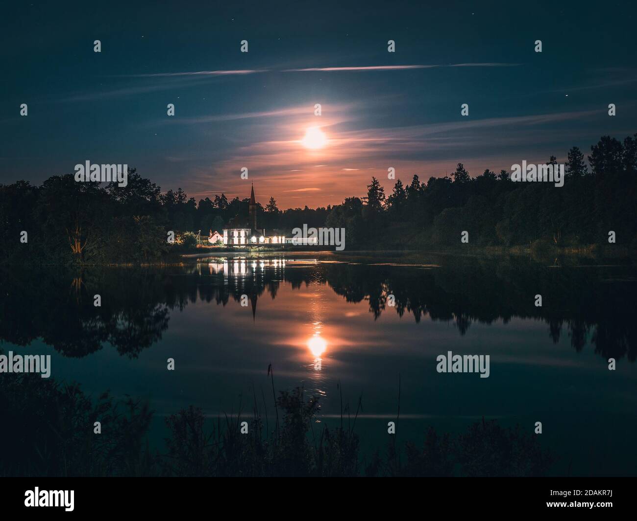 Moonlight over a lake with a castle. Night mystical scenery. Full moon ...