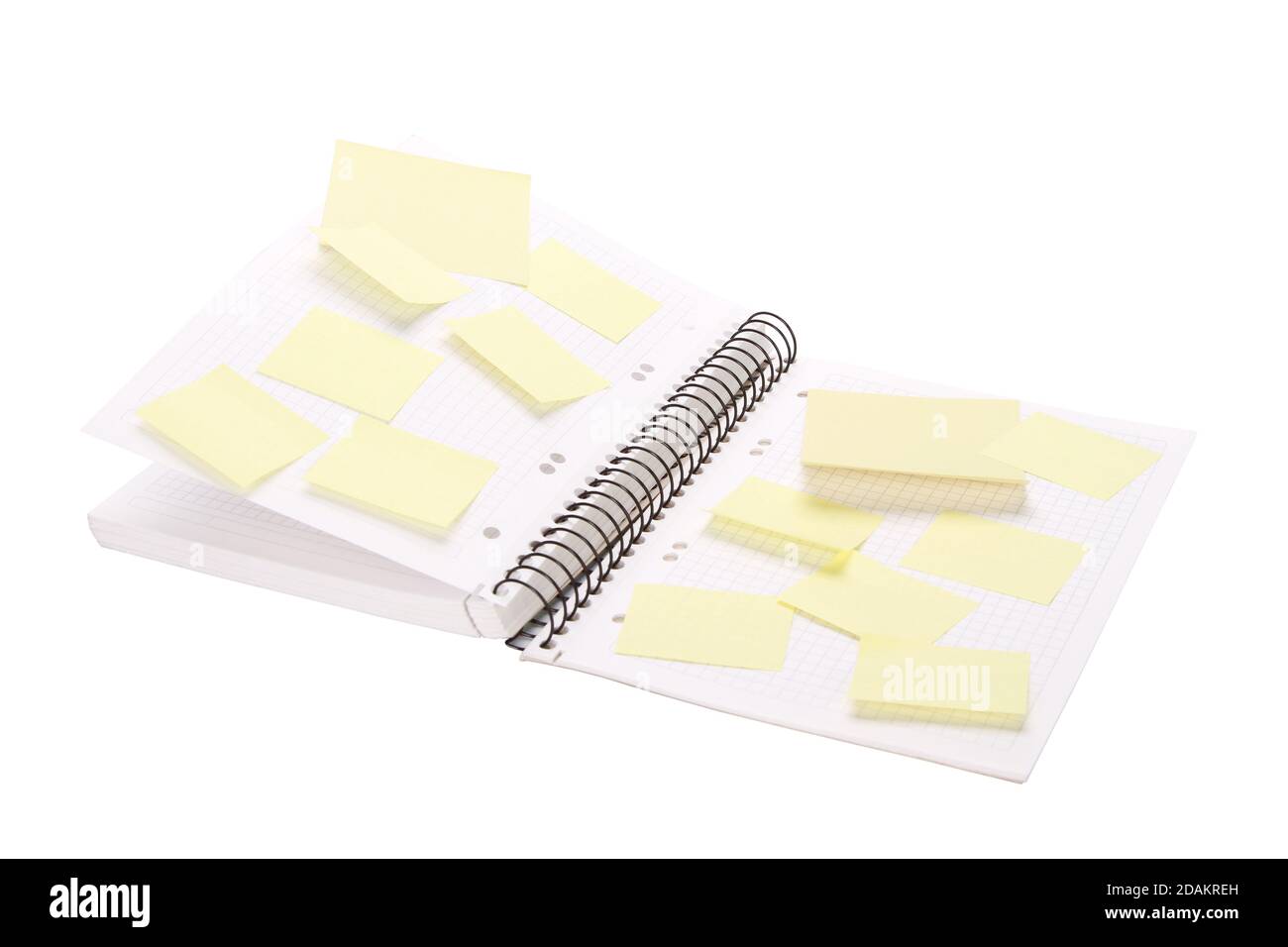 Notebook full of sticky notes on a white surface Stock Photo - Alamy