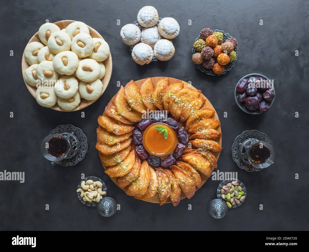 Festive Ramadan food background. Arab sweets. Arabian pancake stuffed ...