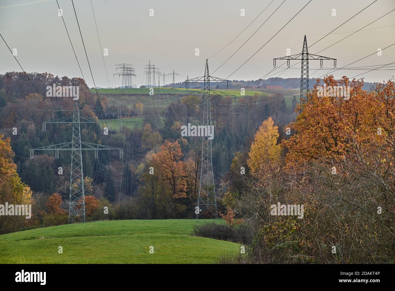 Large transmission towers in the countryside. Different types of ...