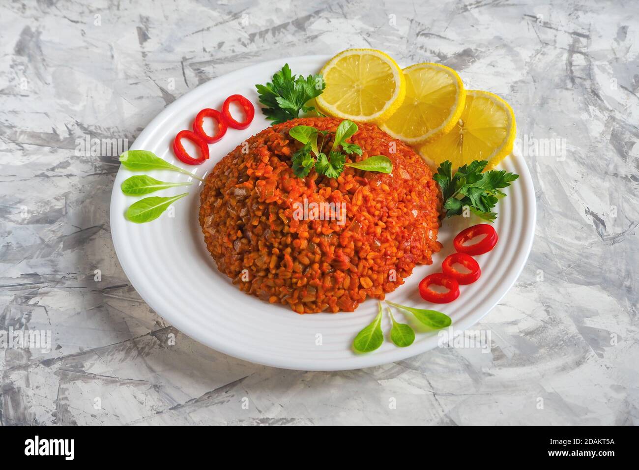 Bulgur wheat pilaf with chickpeas and vegetables Stock Photo - Alamy