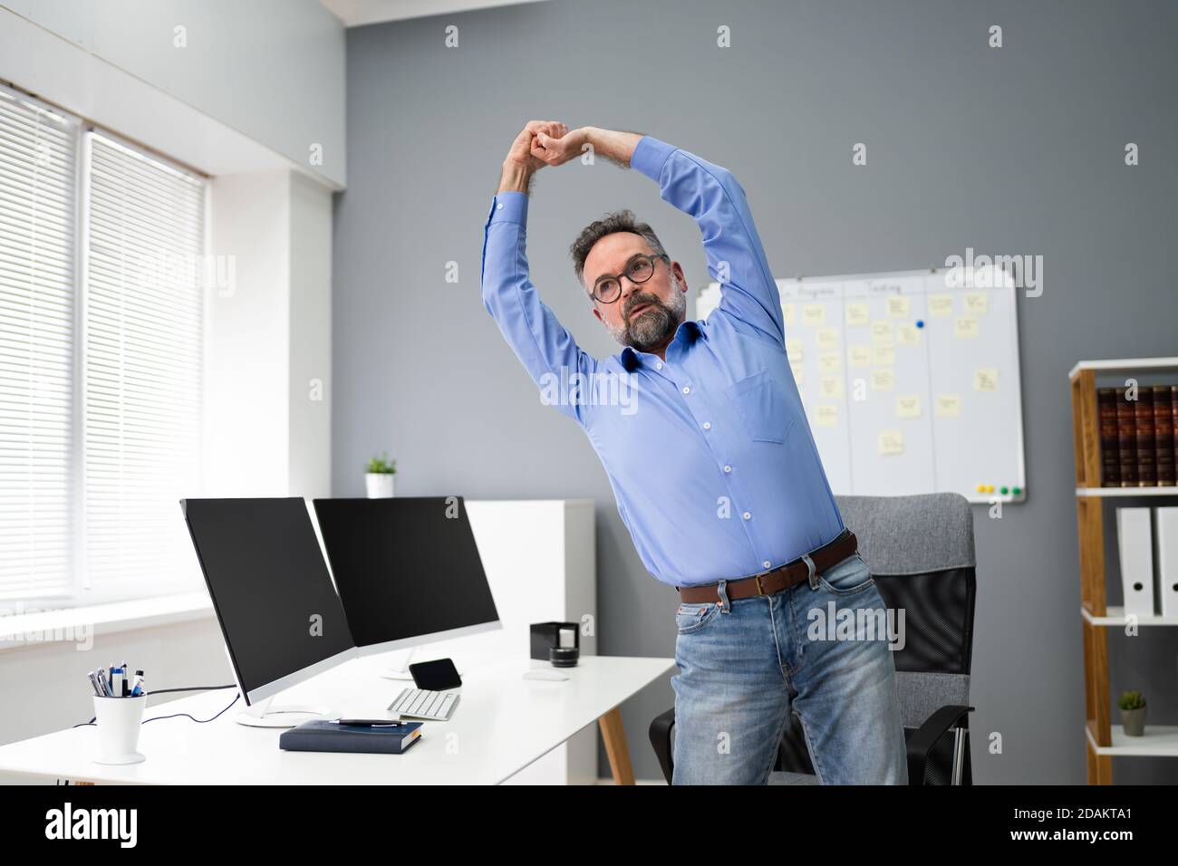 Stretching Office Workout. Desk Stretch Exercise At Workplace Stock ...