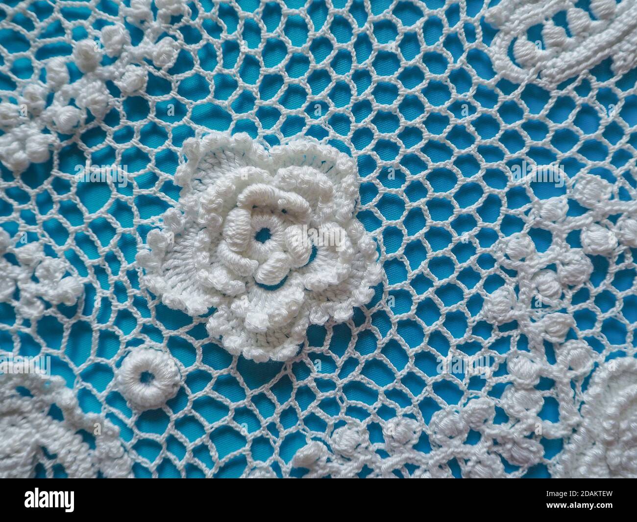 Irish lace crochet. The elements of white knitted dress Stock Photo - Alamy