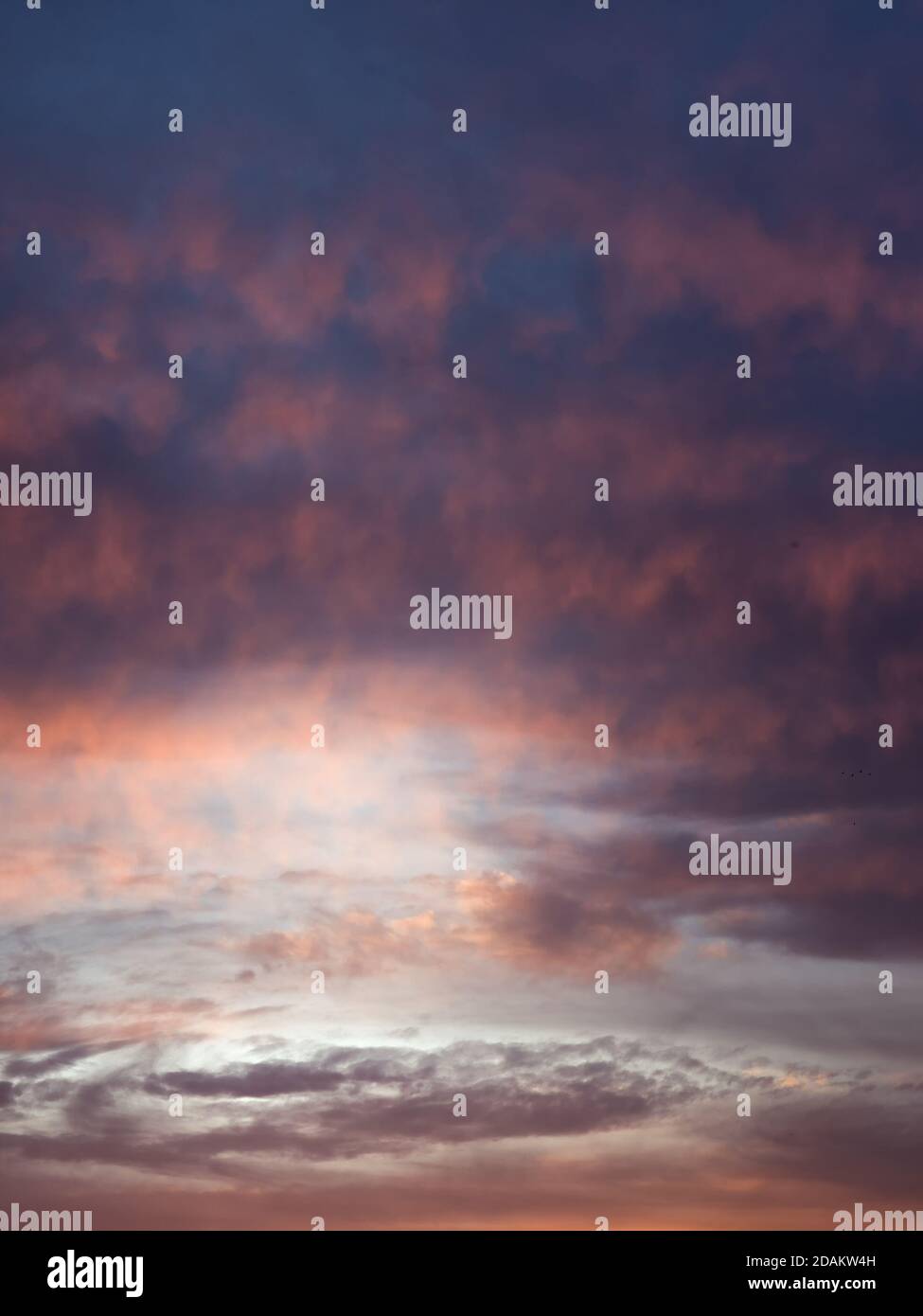 Formation of a cyclone in the sky. Colorful cloudy sky at sunset. Sky ...